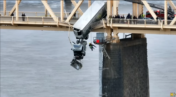 Driver Rescued From Sysco Semi Dangling Over River